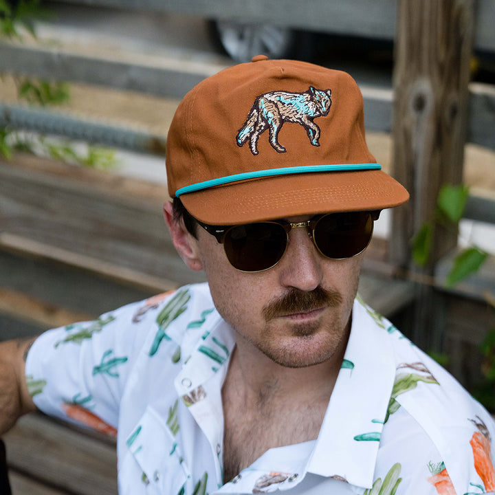 Hats – Raised by Coyotes